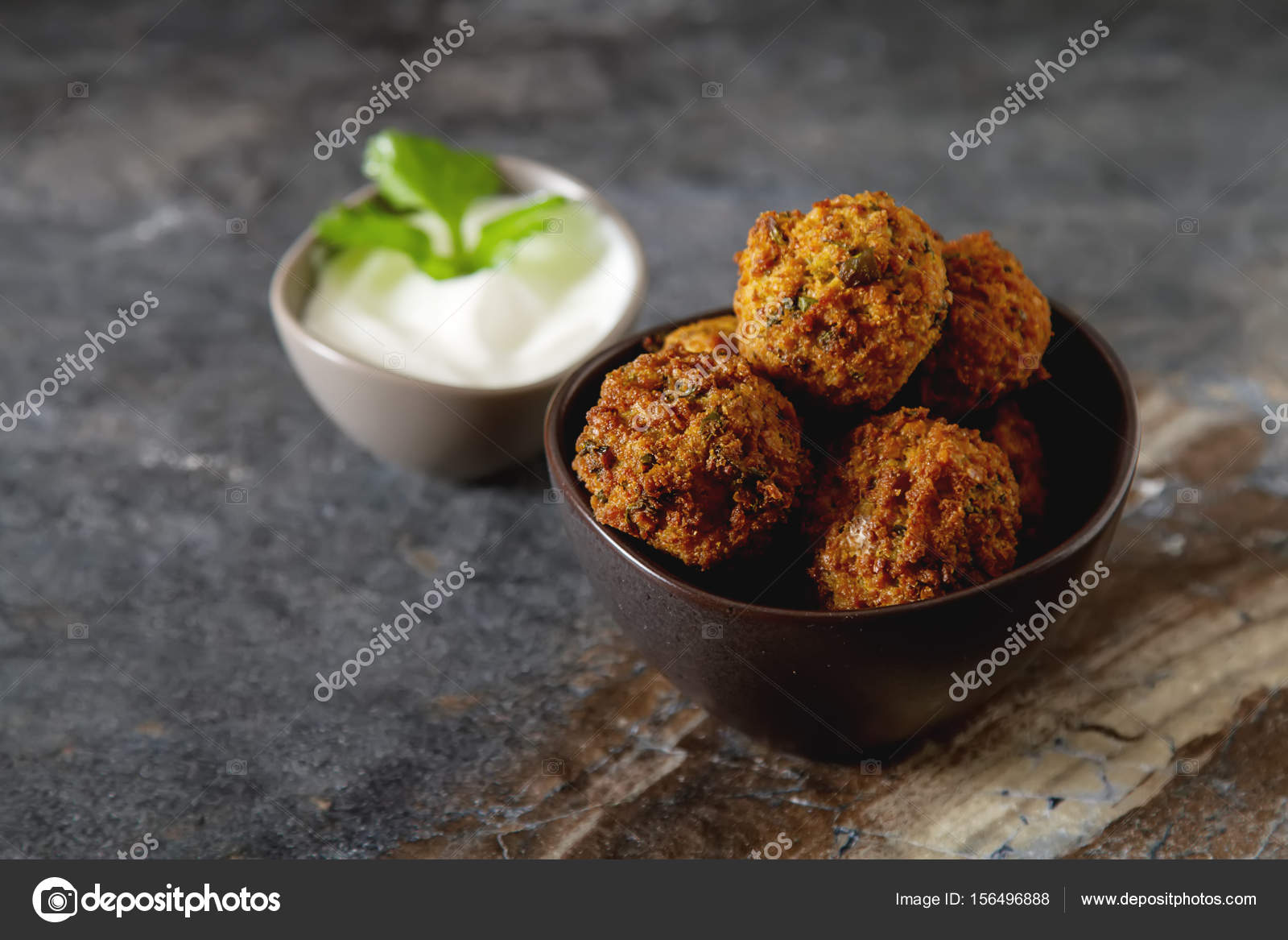 Middle Eastern traditional dishes. Falafel with sour cream. Vege Stock ...