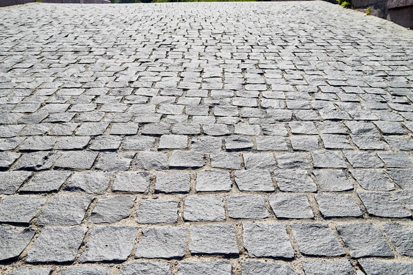 Paving slabs of bricks on the ground. Brick background outdoor - Stock ...