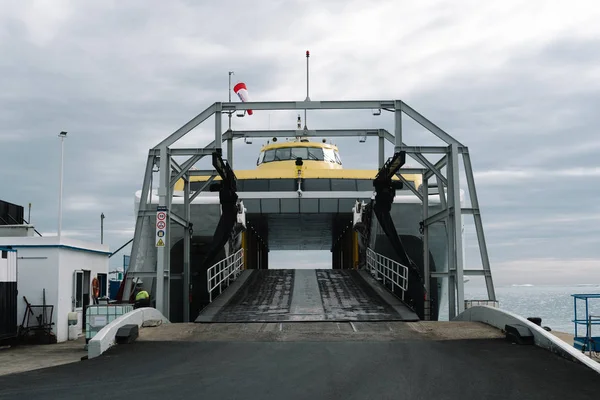 Ferry Boat Ship with open Ramp and empty Car Deck ready to board cars ...