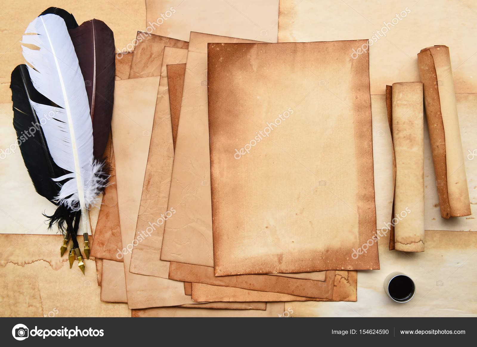 Old paper with feather and ink Stock Photo by ©nimon_t 154624590