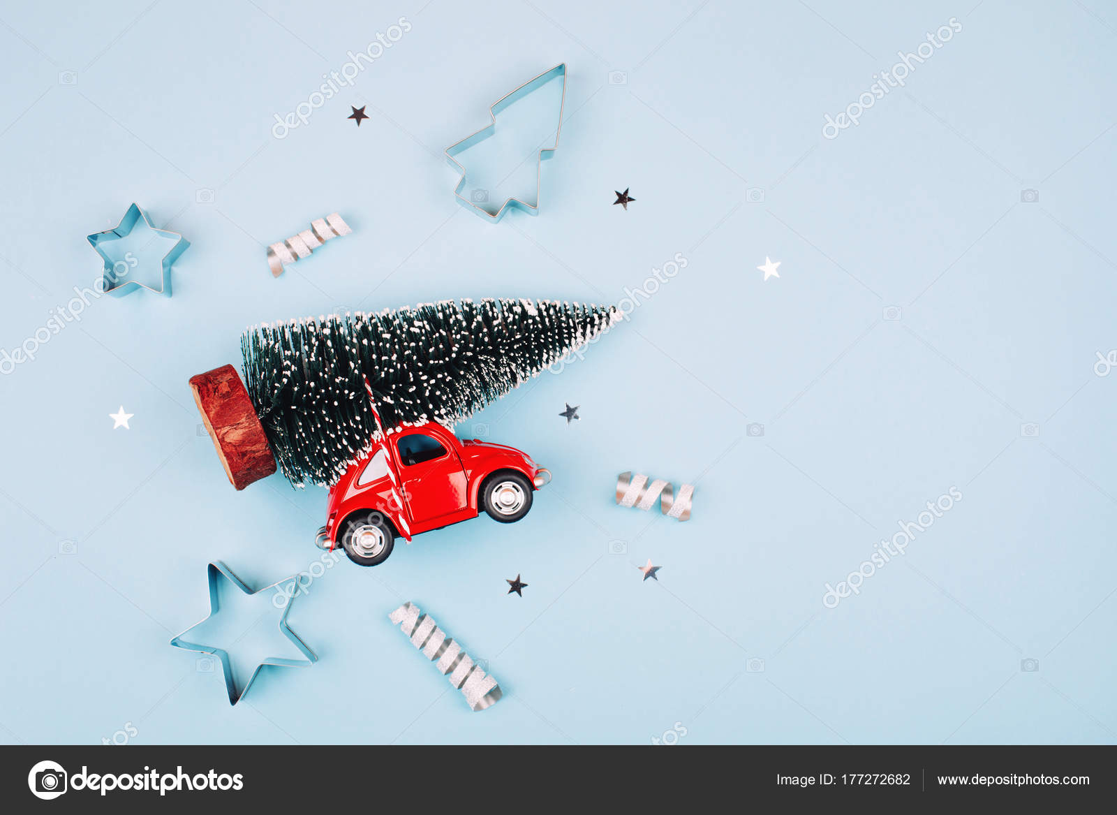 Toy red car with fir tree Stock Photo by ©Efetova 177272682