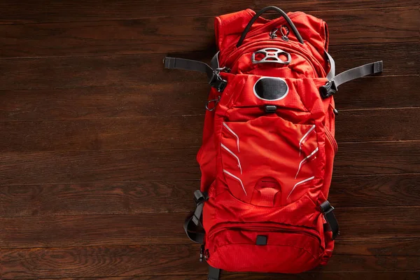 School backpack on wooden background — Stock Photo © belchonock #81256770