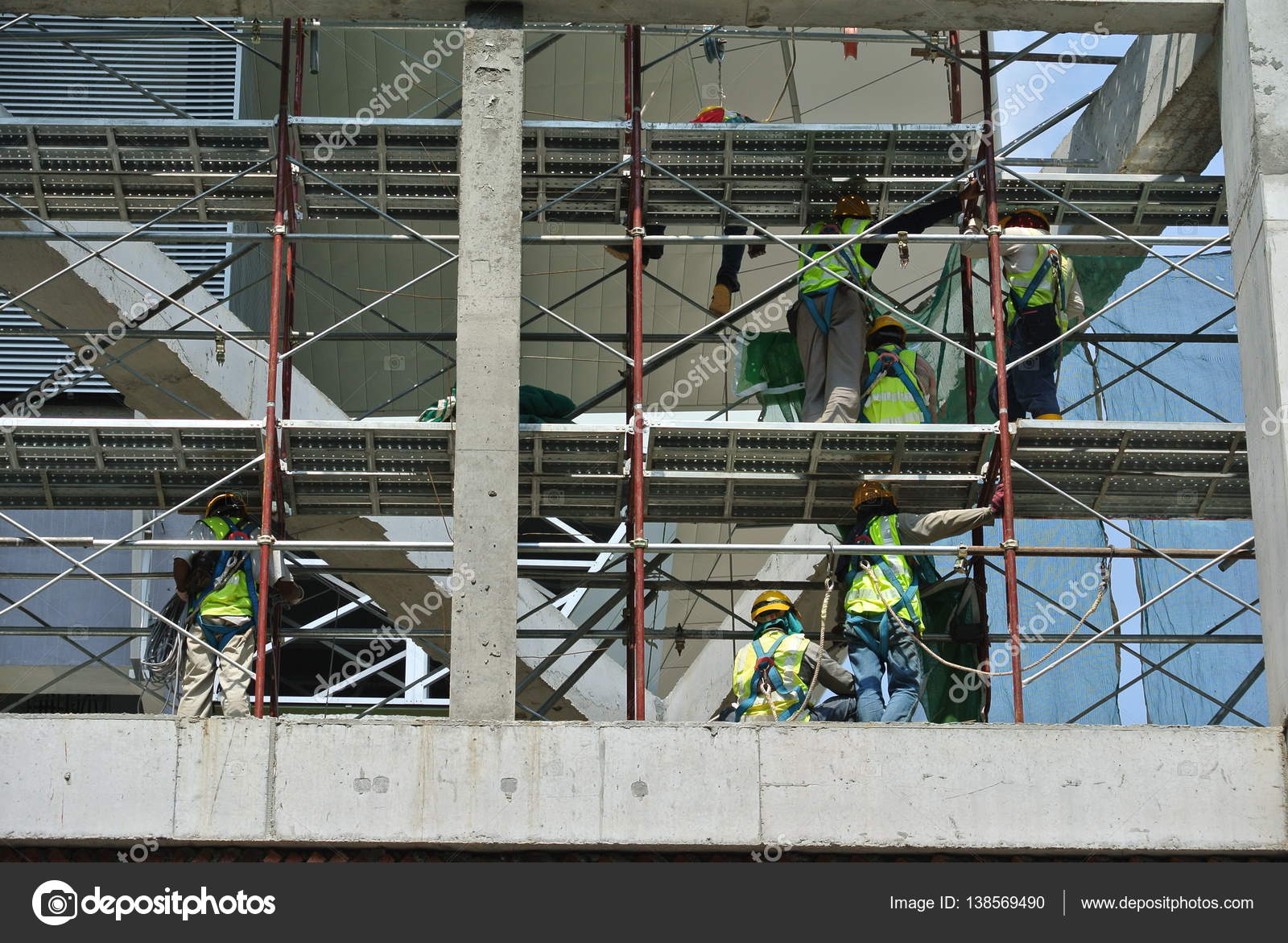 Construction workers working at high level – Stock Editorial Photo ...