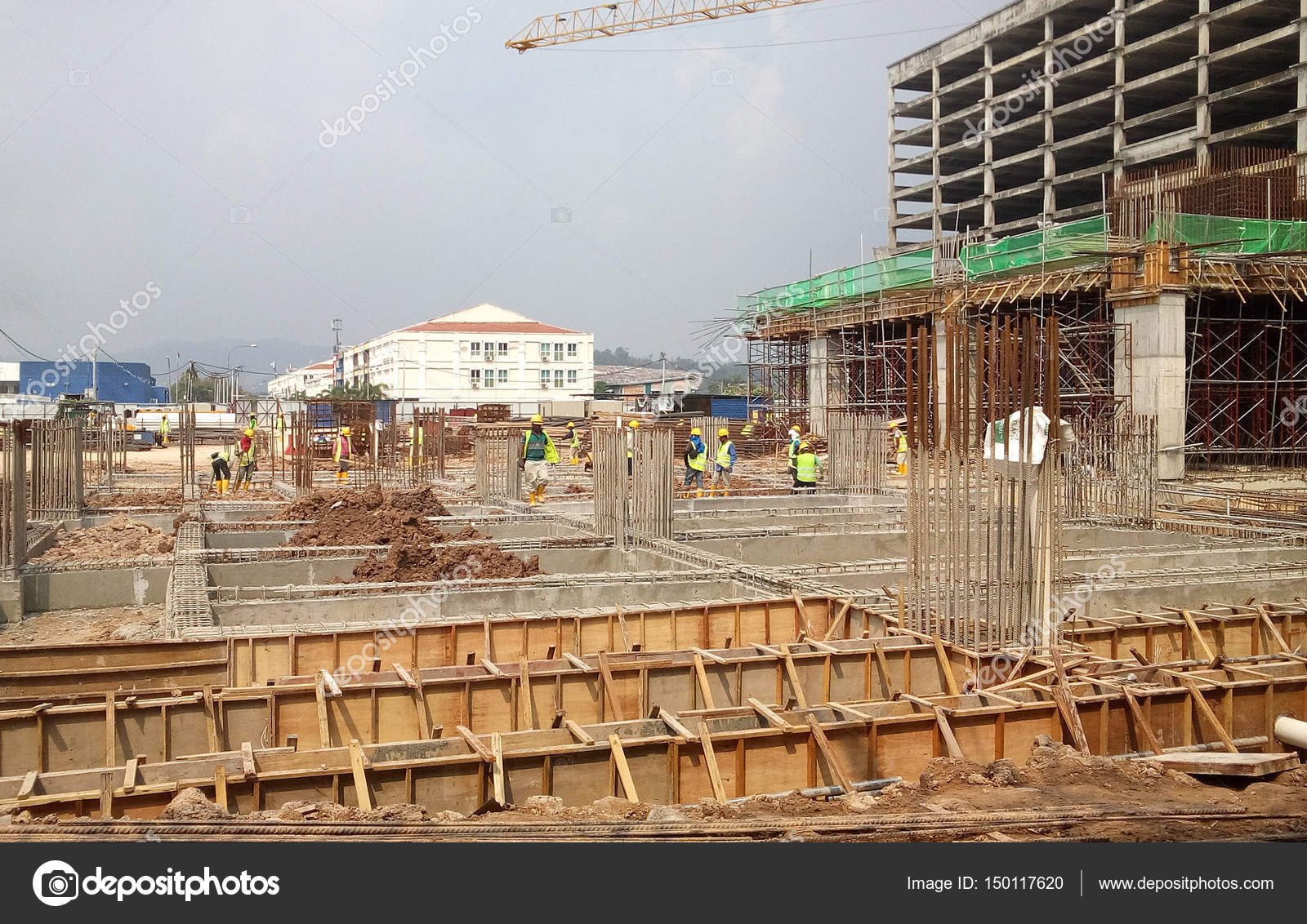 Timber form work and scaffolding used by construction workers at the ...