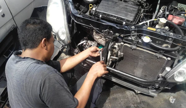 Mechanical fixing of the car engine Stock Photos, Royalty Free ...