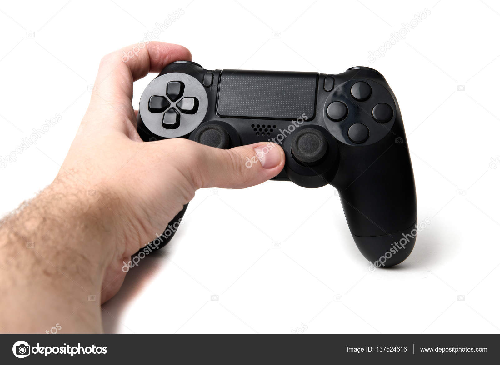Hand holding video game controller isolated on white background Stock ...