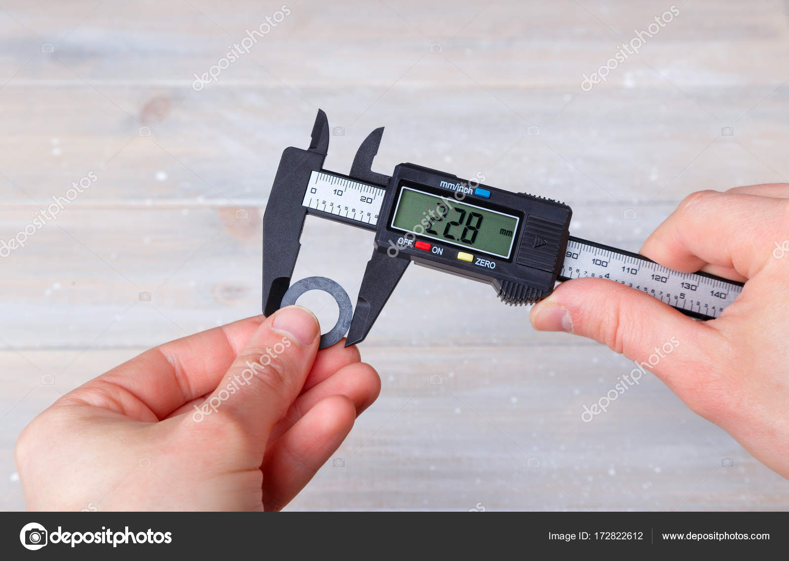 Measurement with electronic caliper Stock Photo by ©maksim_e 172822612