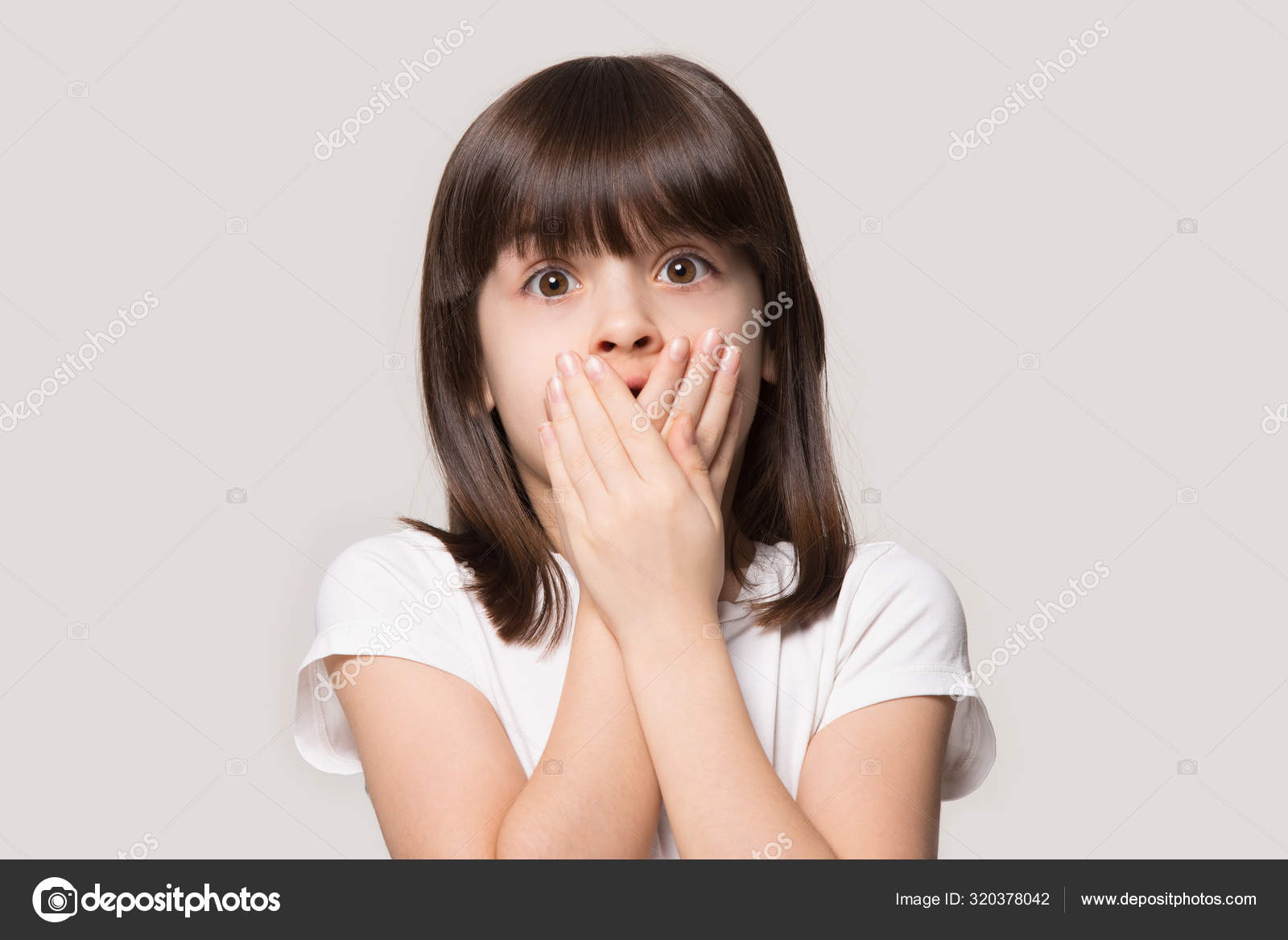 Close up portrait with scared little brown-haired girl. Stock Photo by ...