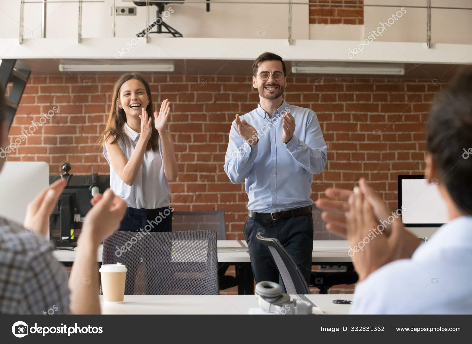 Excited managers applaud greeting coworker with work success — Stock ...