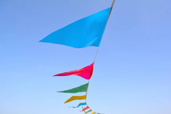 Triangle flags hanging on the rope — Stock Photo © goldenshrimp #147114395