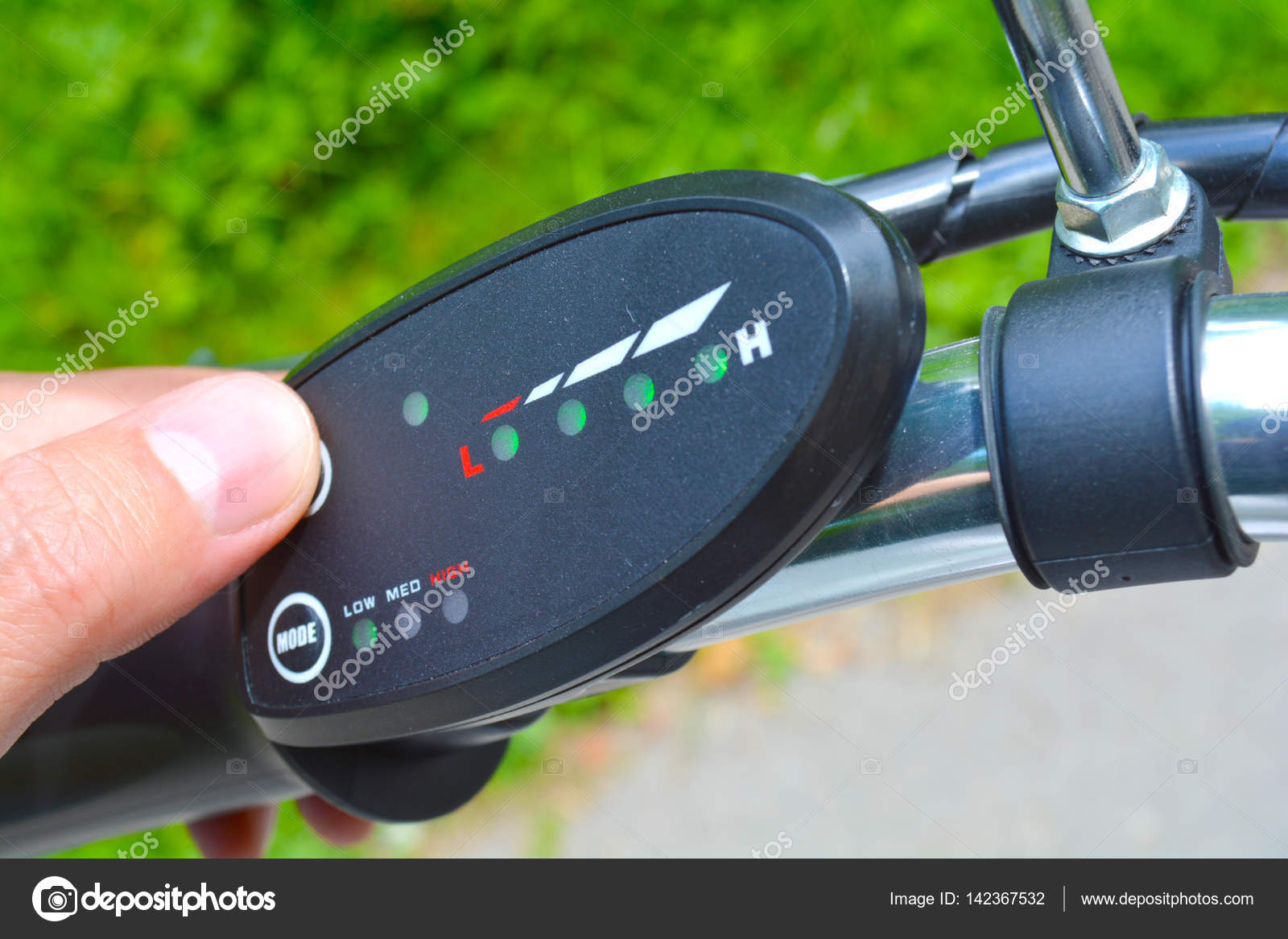 Man turning on electric bike — Stock Photo © goldenshrimp #142367532
