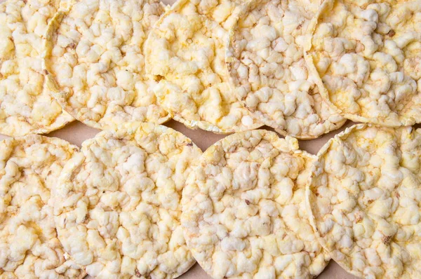 Circle shaped corn snacks Stock Photo by ©CreativeFamily 134200726