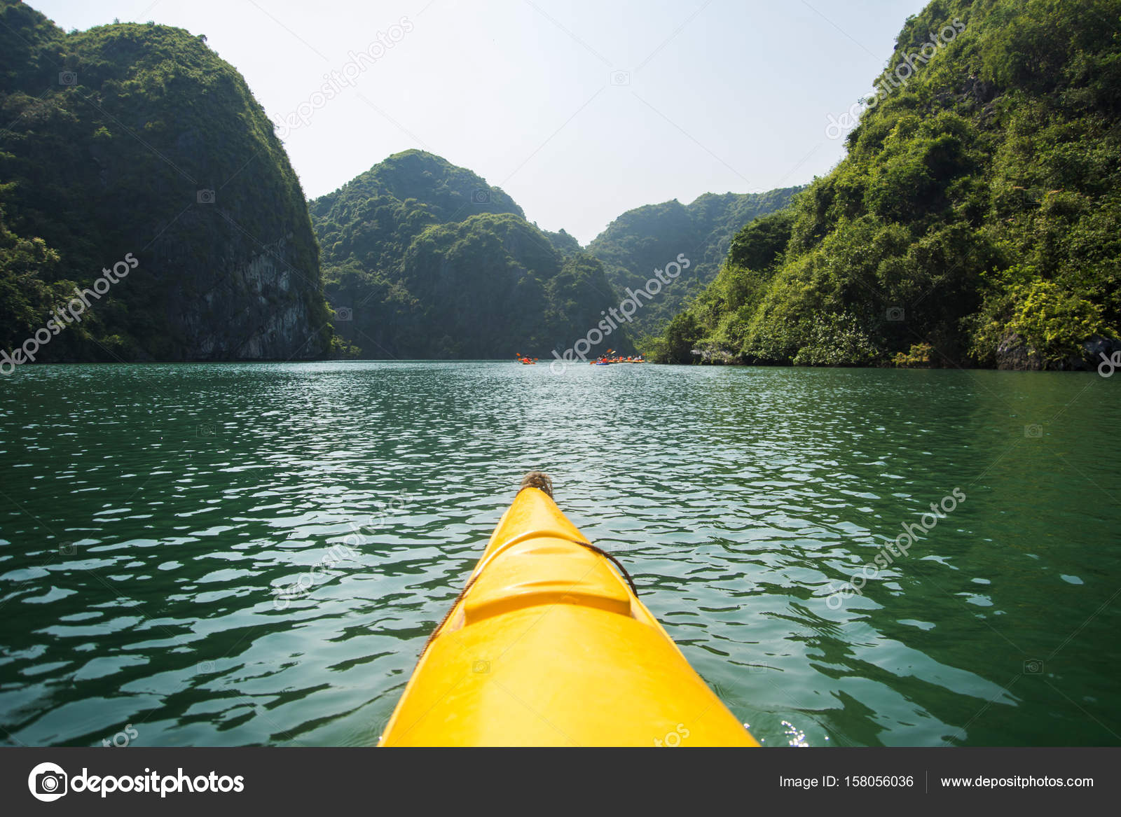 Kayaking though the Halong bay first person Stock Photo by ...
