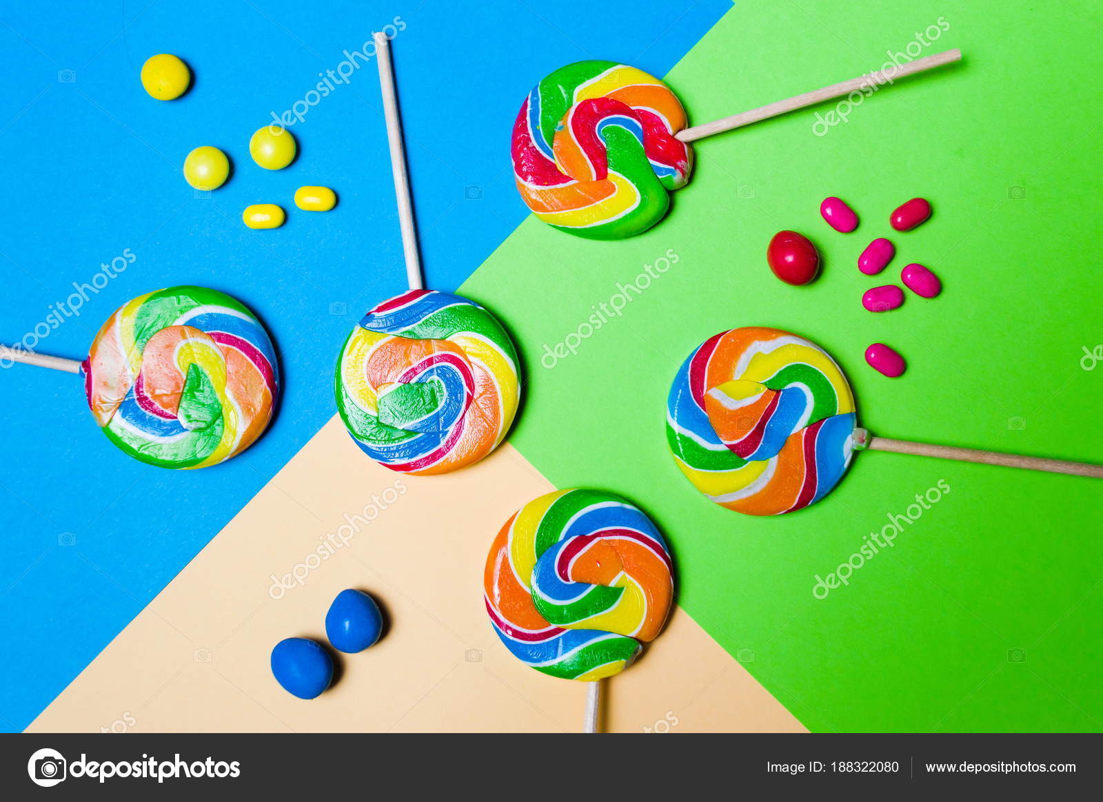 Lollipop candies on colorful background Stock Photo by ©CreativeFamily ...