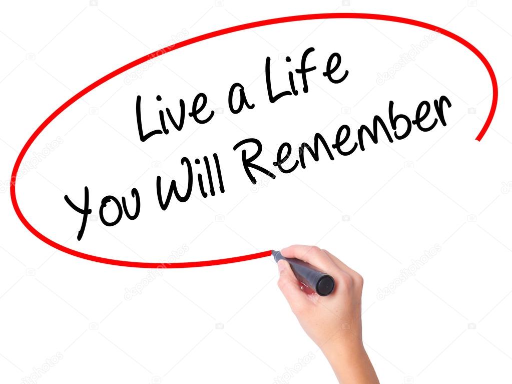 Women Hand writing Live a Life You Will Remember with black mark ...