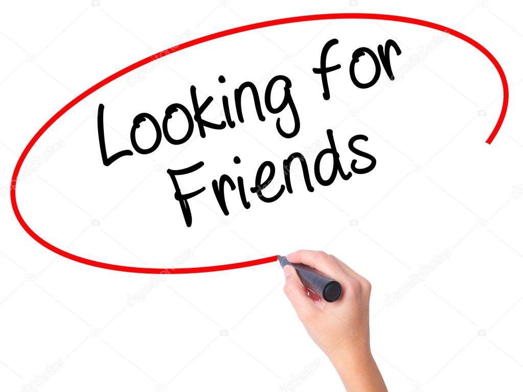 Women Hand writing Looking for Friends with black marker on visu ...