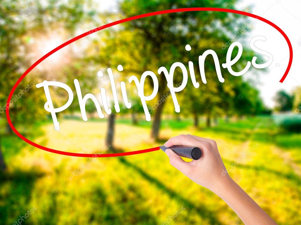 Woman Hand Writing Philippines with a marker over transparent bo ...