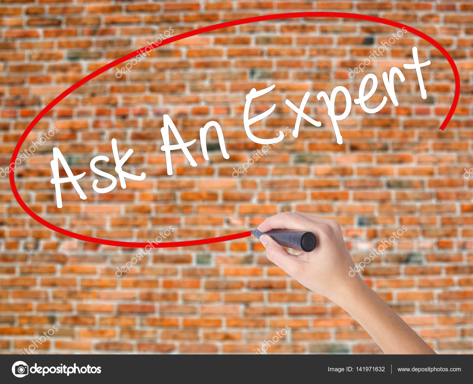 Woman Hand Writing Ask An Expert with black marker on visual scr ...