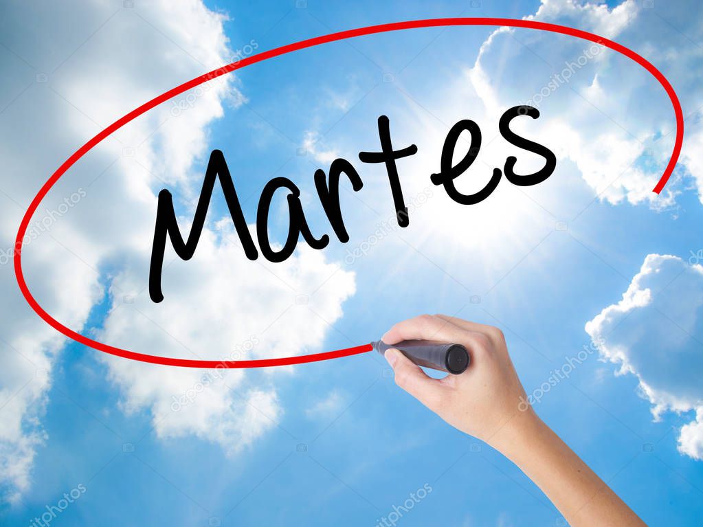 Woman Hand Writing Martes (Tuesday in Spanish) with black marker ...
