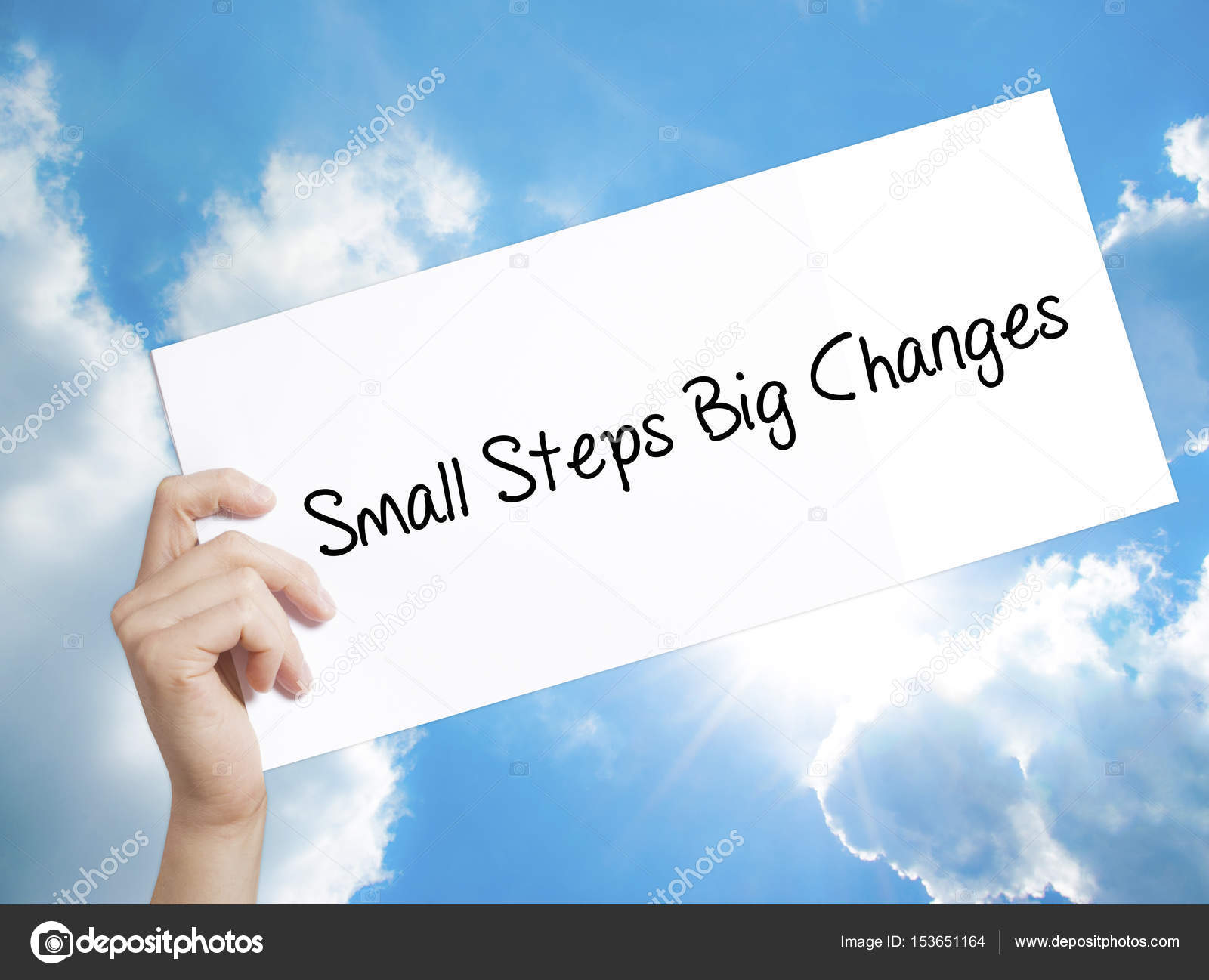 Small Steps Big Changes Sign on white paper. Man Hand Holding Pa ...
