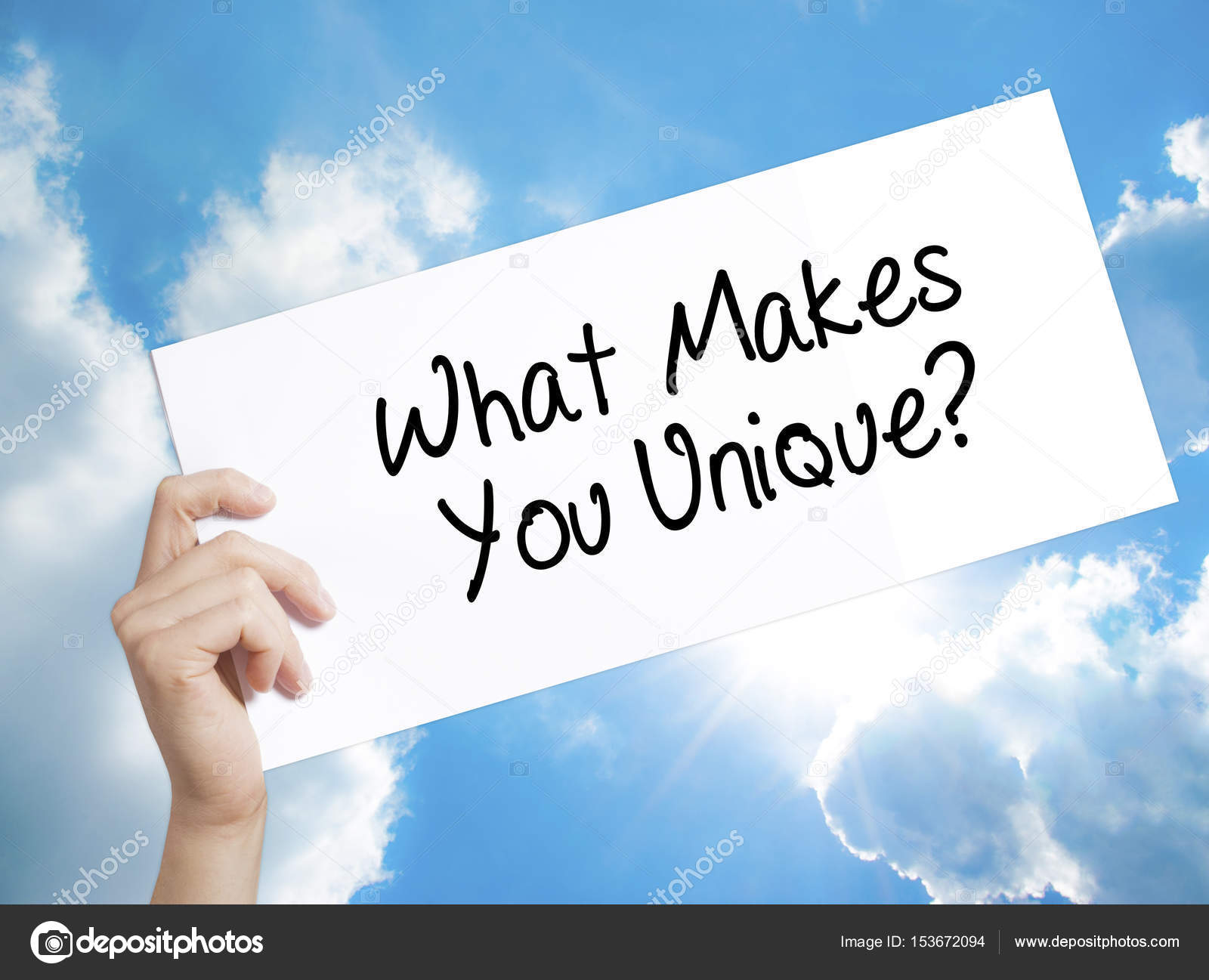 What Makes You Unique? Sign on white paper. Man Hand Holding Pap Stock ...
