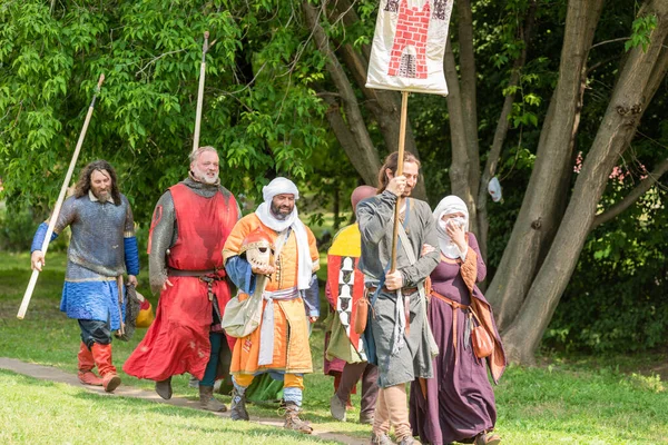 Moscow, Russia, June 8, 2019 - A group of people in the clothes of ...