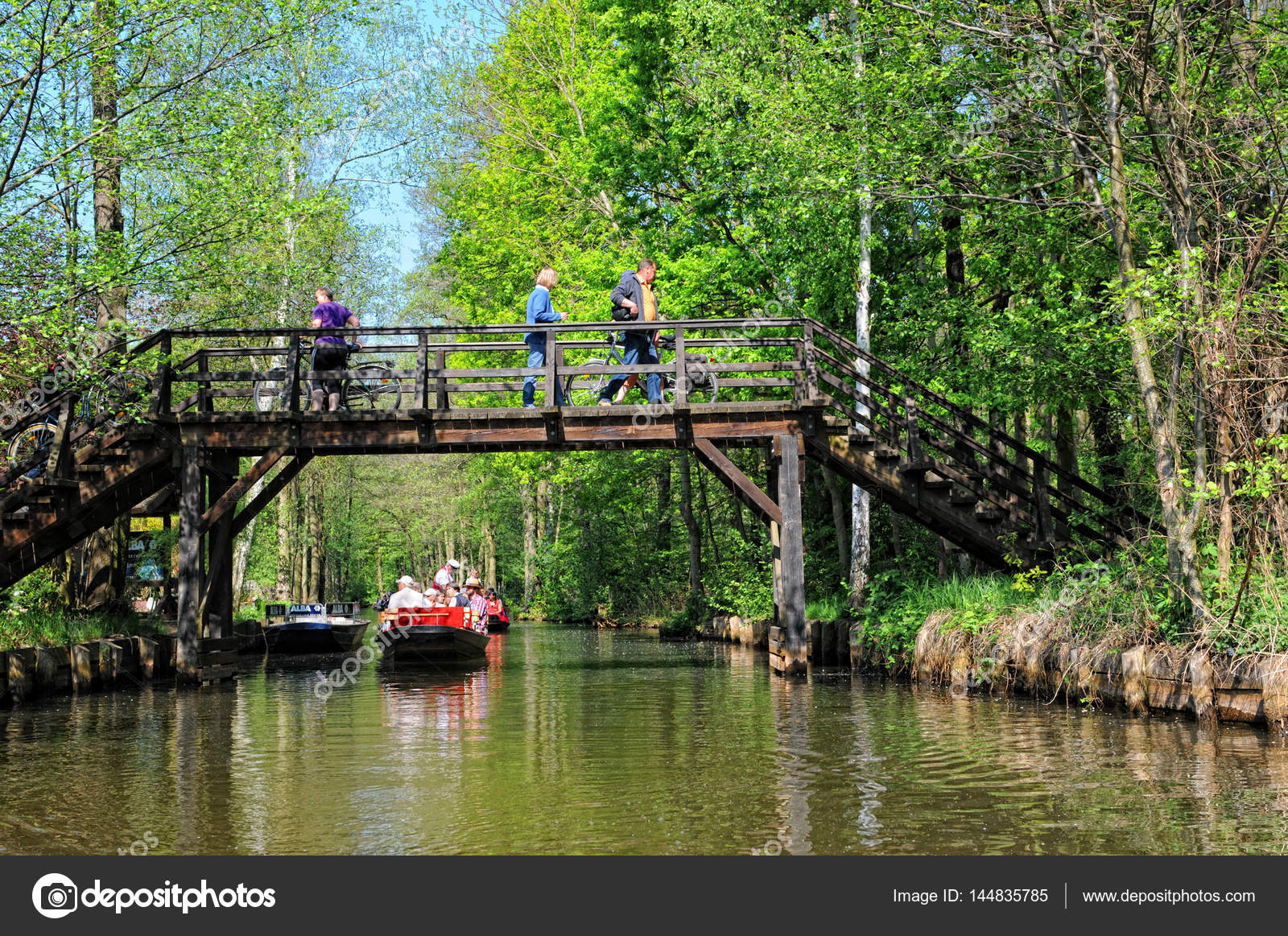 People visiting the Spreeewald with its landscape of spree river ...