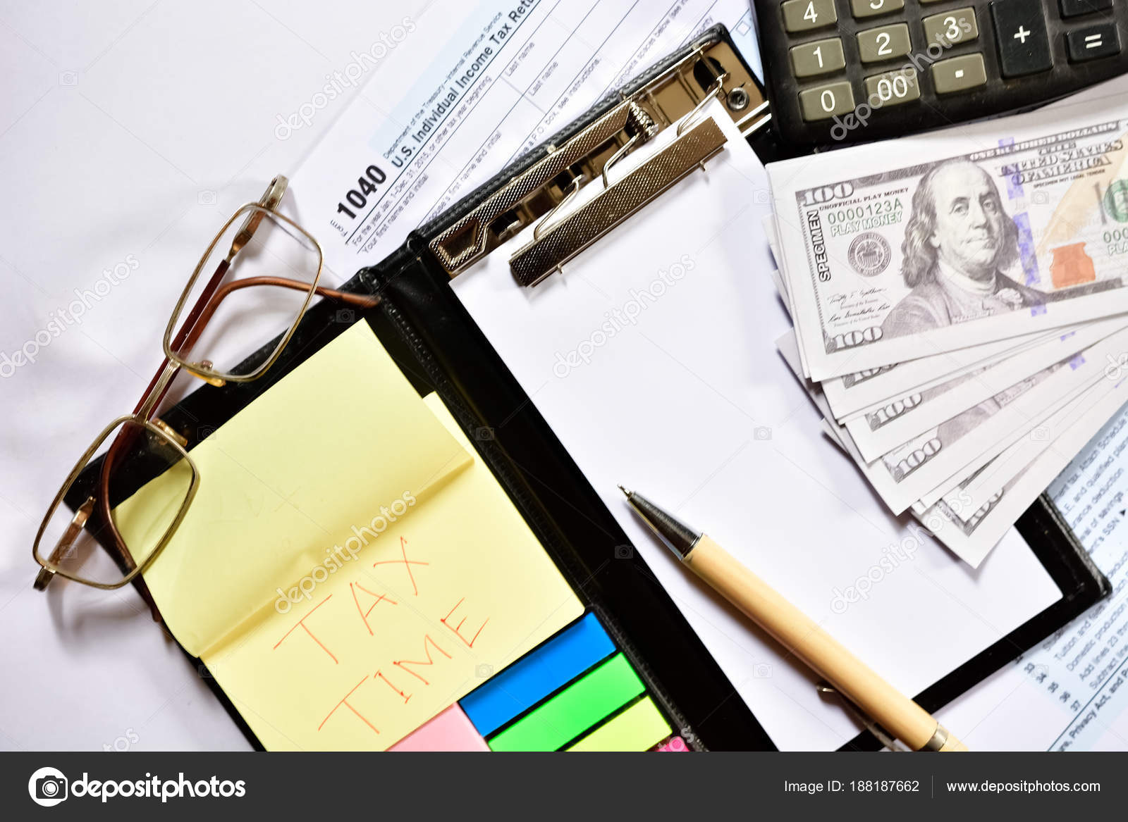 Tax Form Notepad Pen Calculator Table — Stock Photo © sbhaumik #188187662