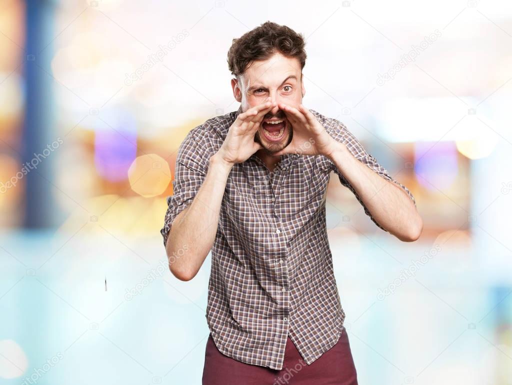 Angry young man shouting Stock Photo by ©kues 128829978