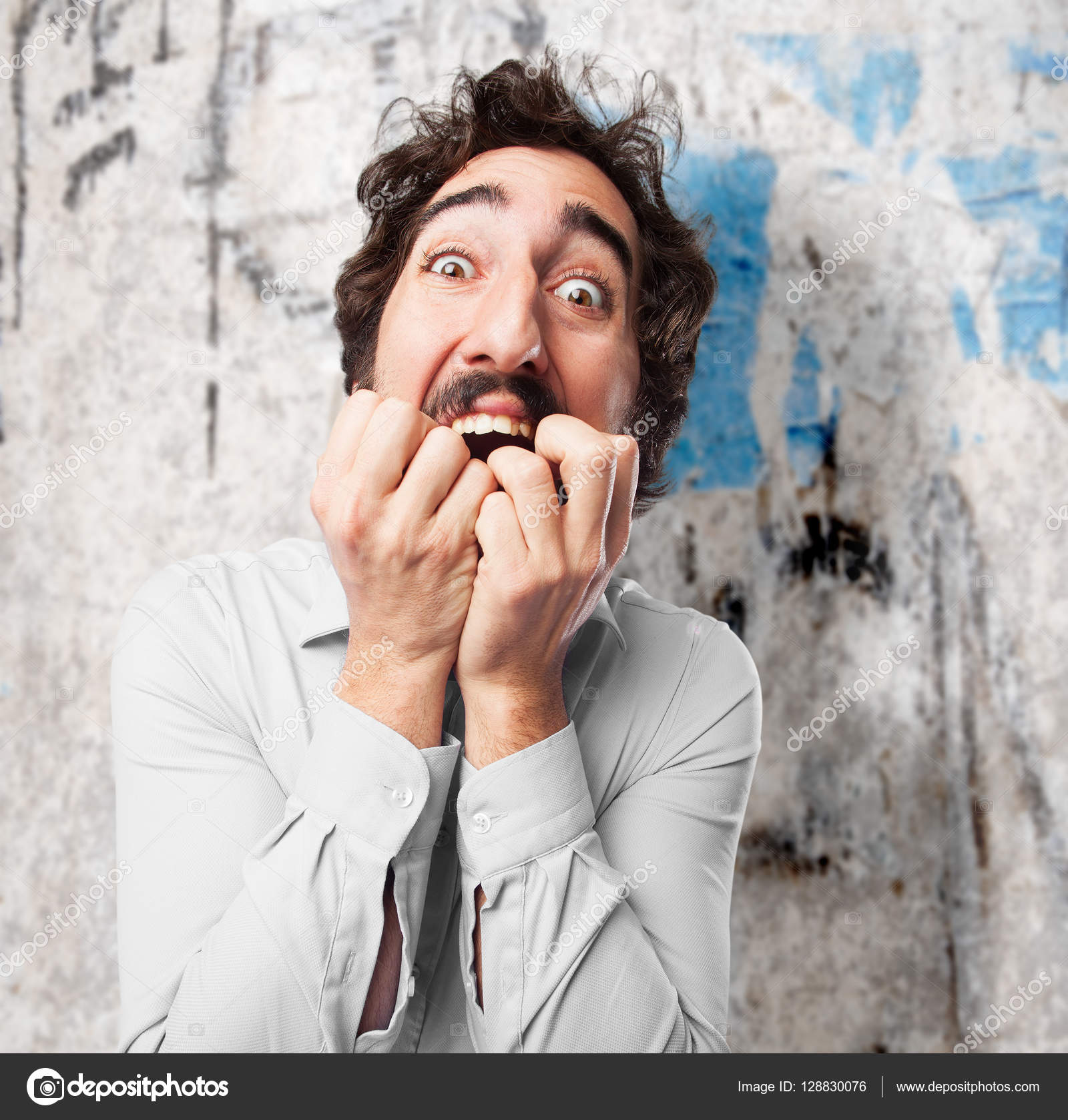 Joven asustado con expresión asustada: fotografía de stock © kues ...