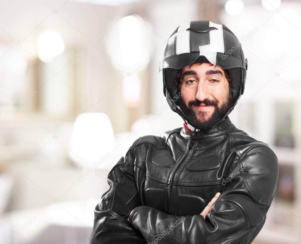 Proud biker smiling Stock Photo by ©kues 128830098