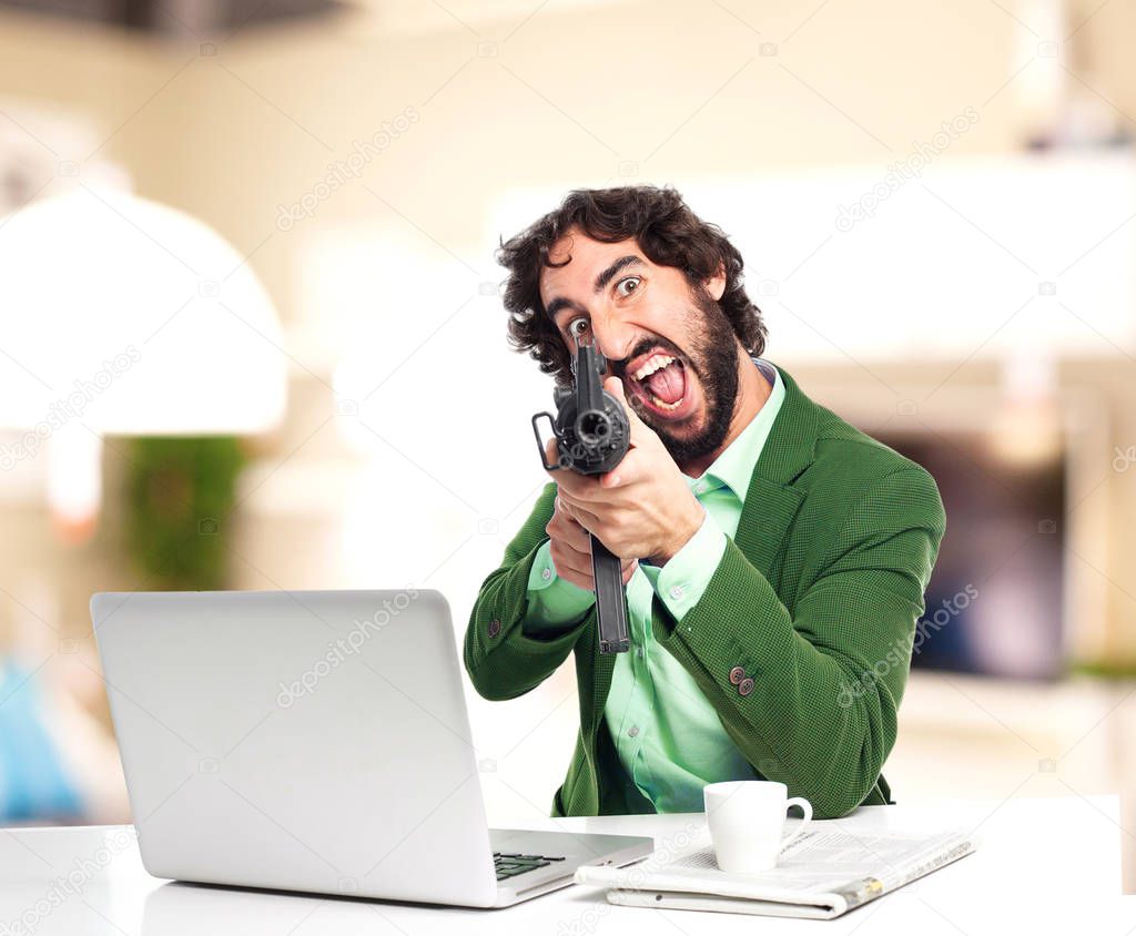 Crazy businessman with gun Stock Photo by ©kues 128843564