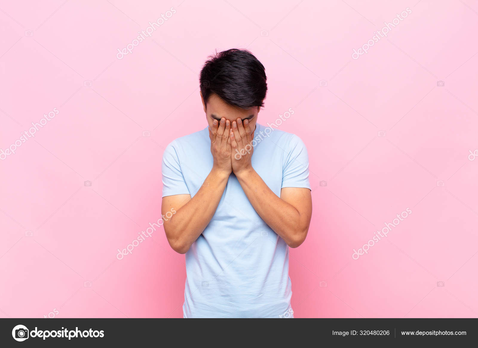 Young Chinese Man Feeling Sad Frustrated Nervous Depressed Covering ...