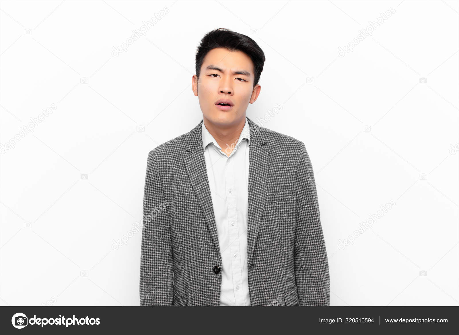 Young Chinese Man Feeling Puzzled Confused Dumb Stunned Expression ...