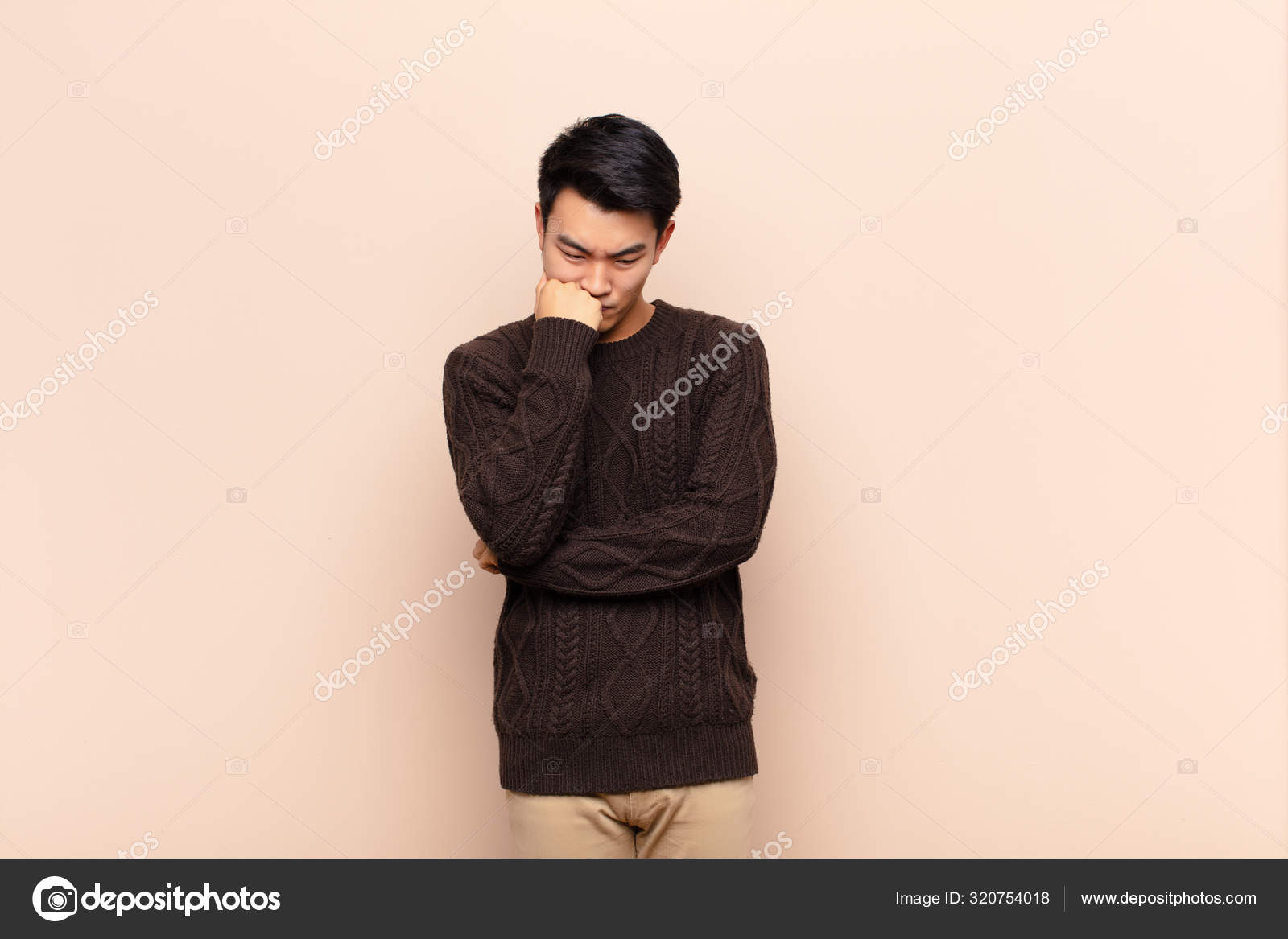 Young Chinese Man Feeling Serious Thoughtful Concerned Staring Sideways ...