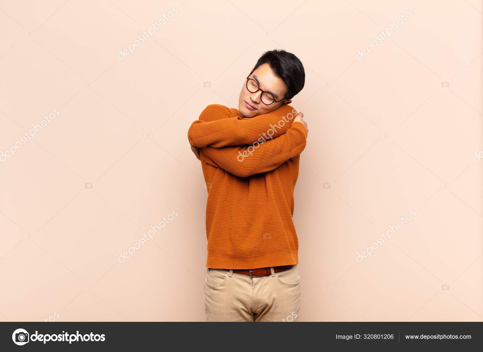 Young Chinese Man Feeling Love Smiling Cuddling Hugging Self Staying ...