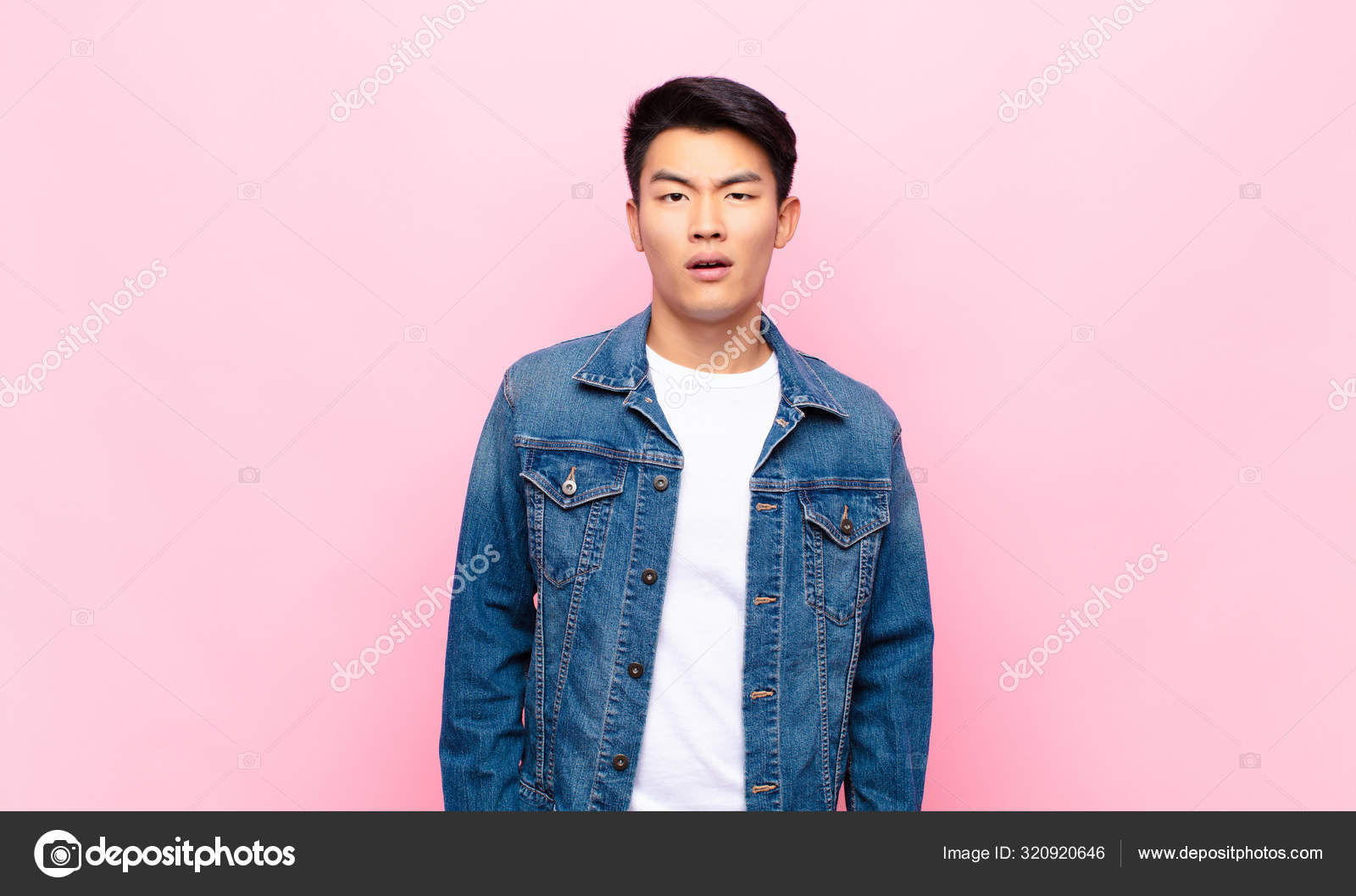 Young Chinese Man Feeling Puzzled Confused Dumb Stunned Expression ...