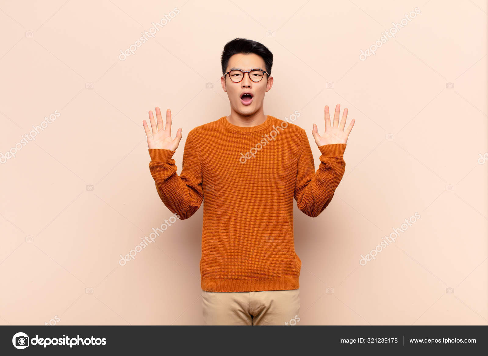 Young Chinese Man Feeling Stupefied Scared Fearing Something ...