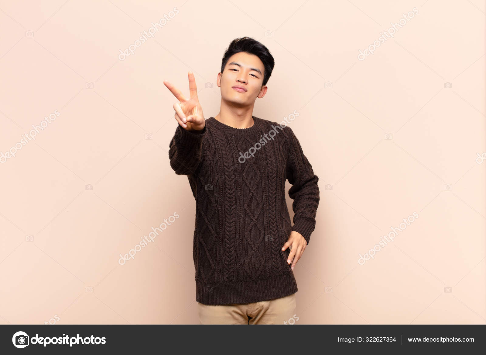 Young Chinese Man Smiling Looking Happy Carefree Positive Gesturing ...