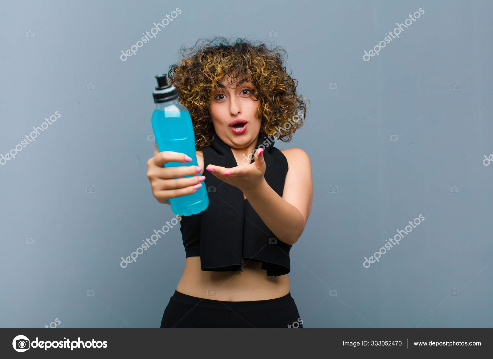 Young Pretty Sports Woman Wearing Fitness Clothes Having Energy Drink ...