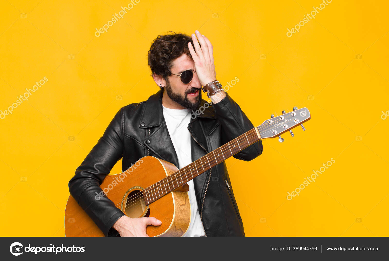 Young Musician Man Laughing Slapping Forehead Saying Doh Forgot Stupid ...