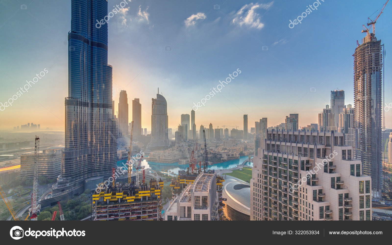 Panoramic skyline view of Dubai downtown during sunrise with mall ...