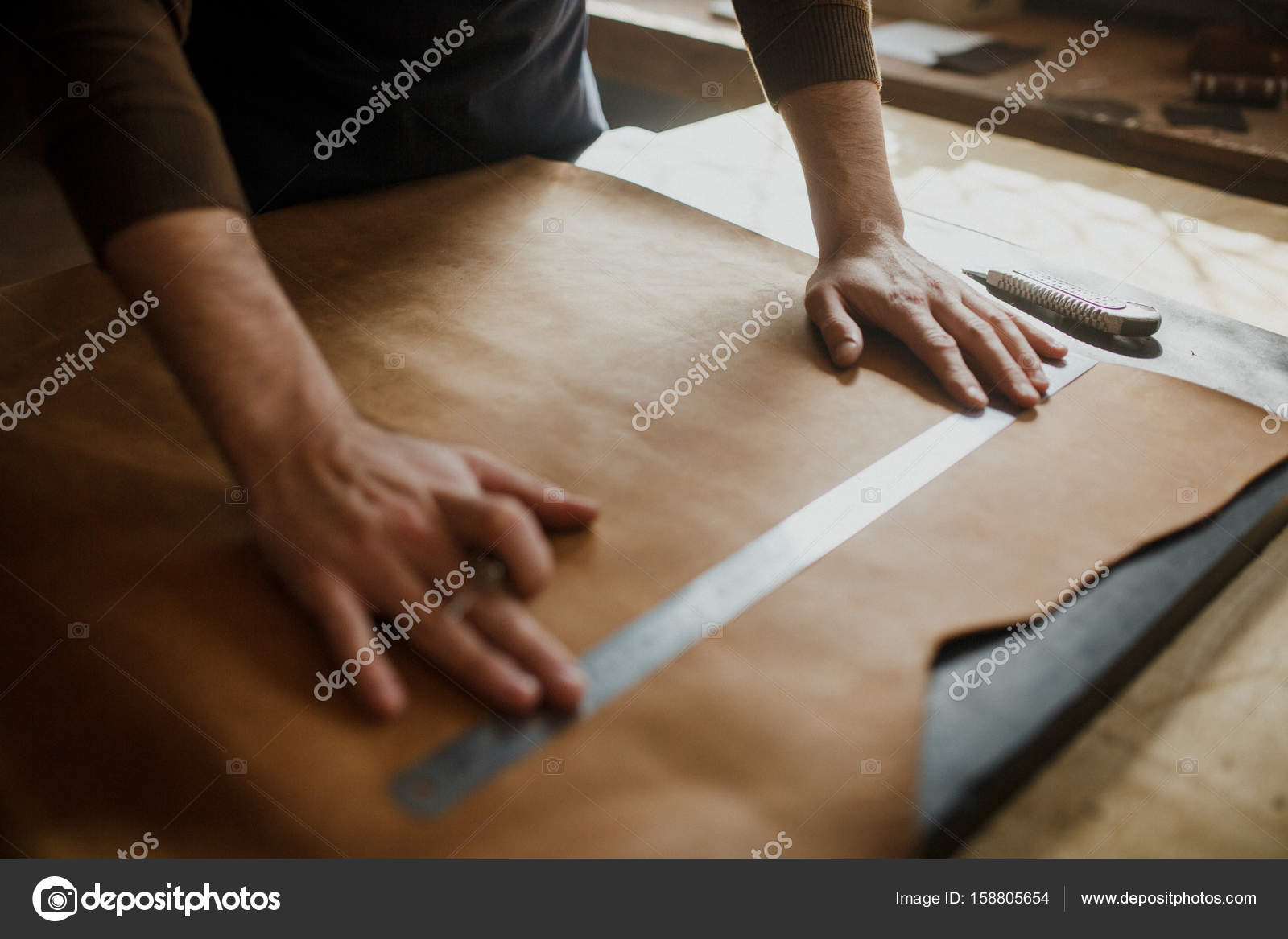 Male hand measuring ruler master skin for the product Stock Photo by ...