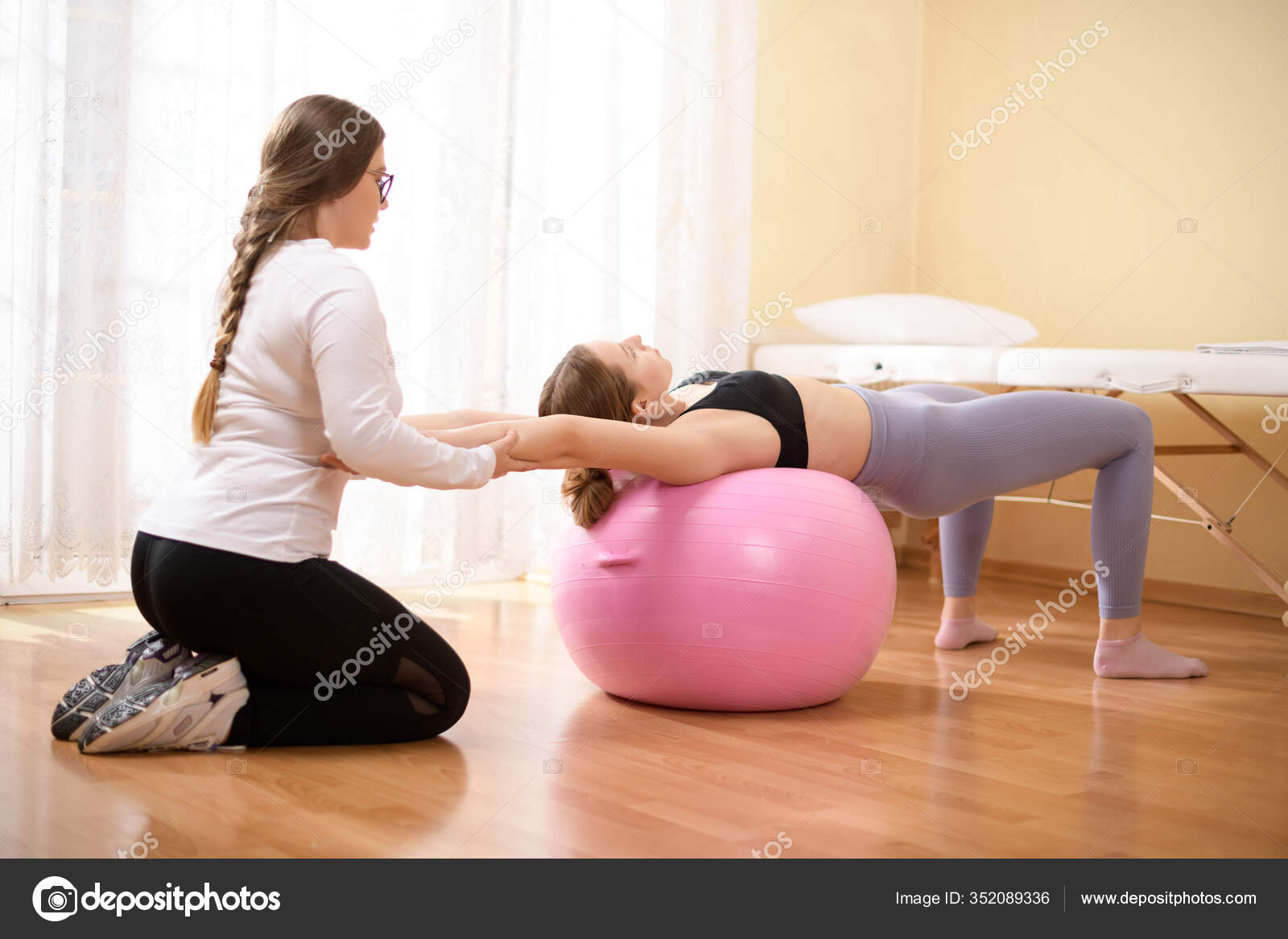 Physiotherapist Working Young Female Client Core Strength Using Fitball Rehabilitation Stock ...