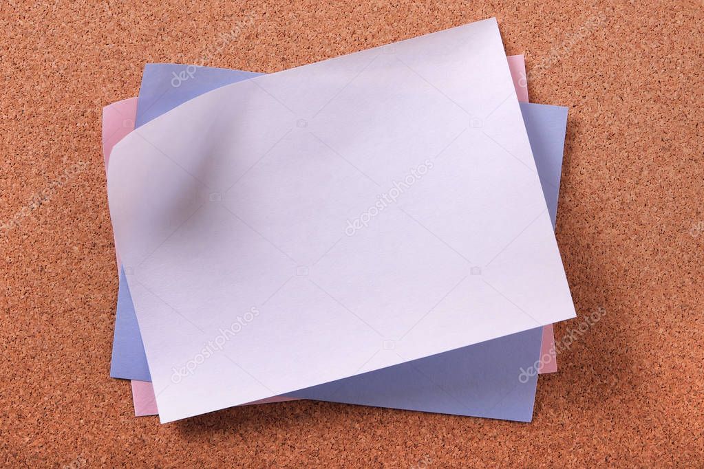 Various different colors sticky post notes cork board background ...