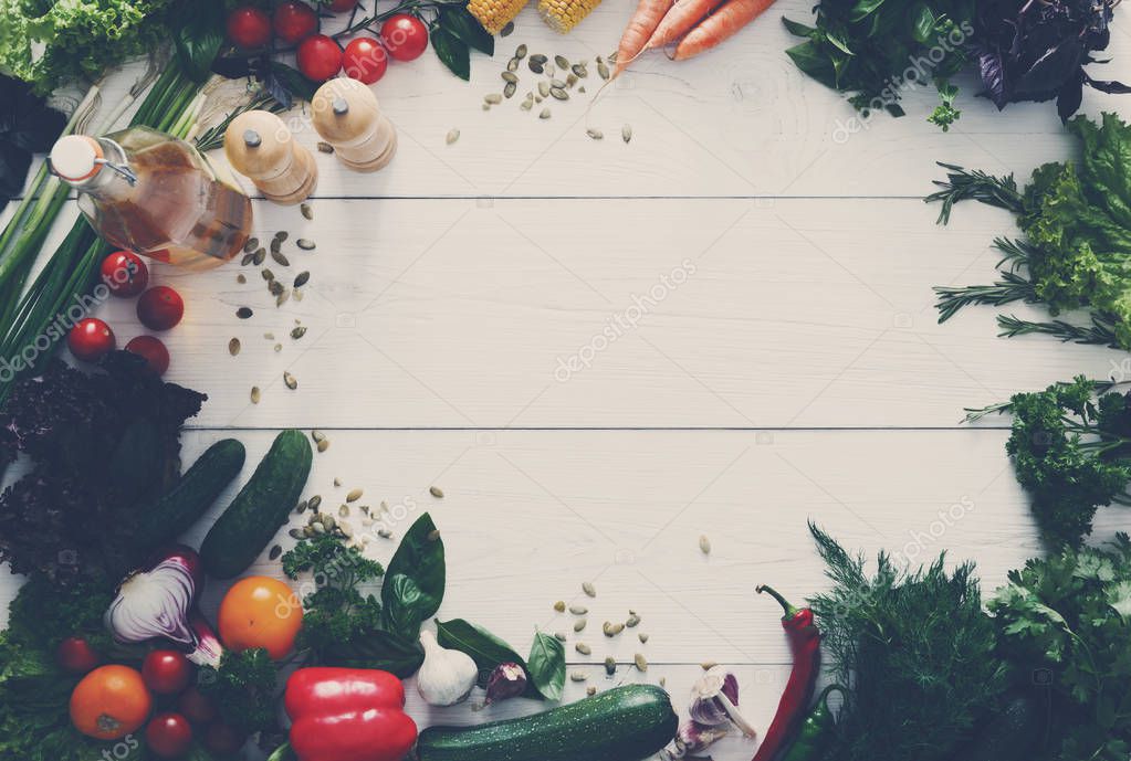 Fresh vegetables border on white wood background with copy space ...