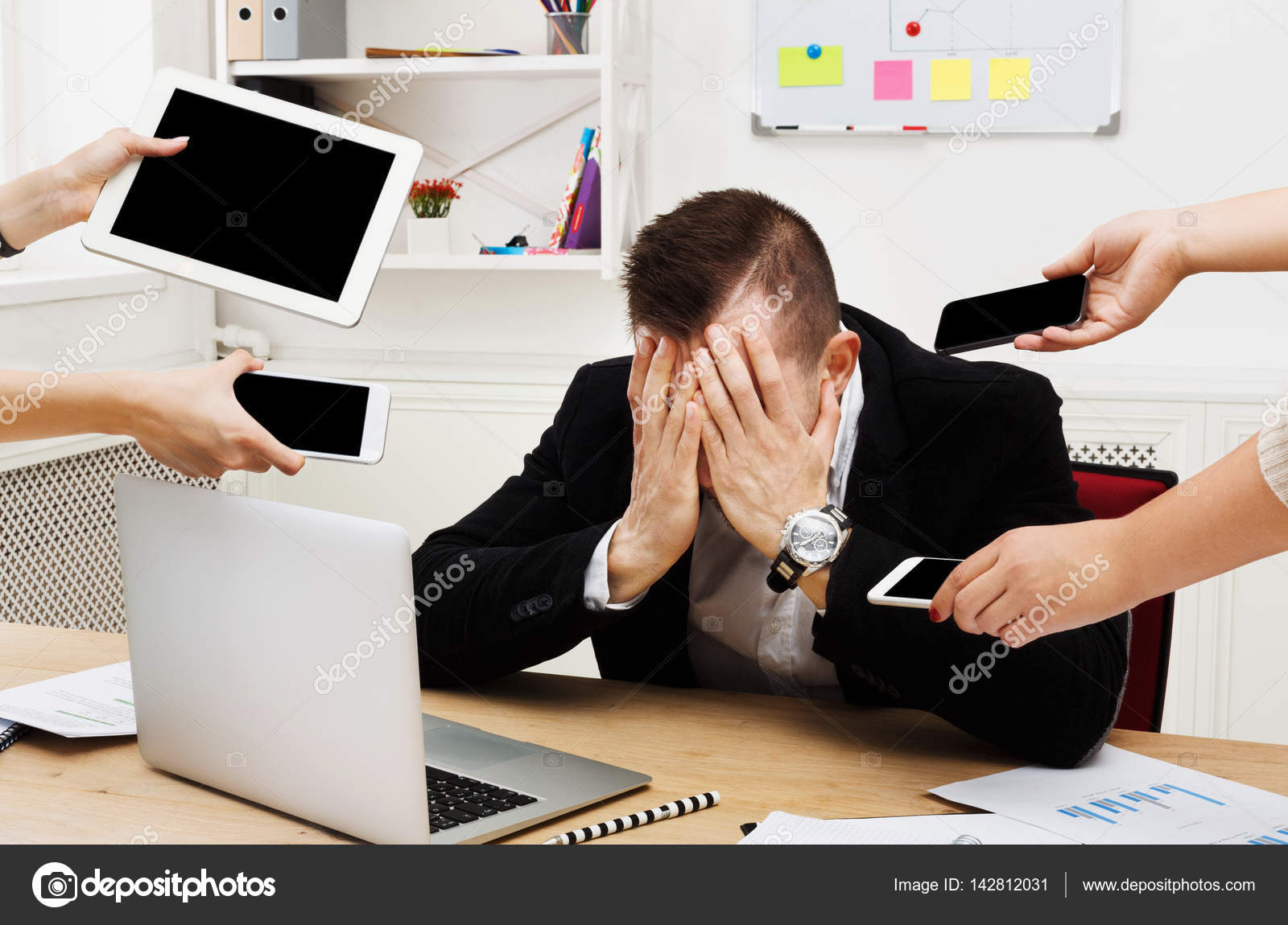 Young stressed overworked businessman in modern office — Stock Photo ...