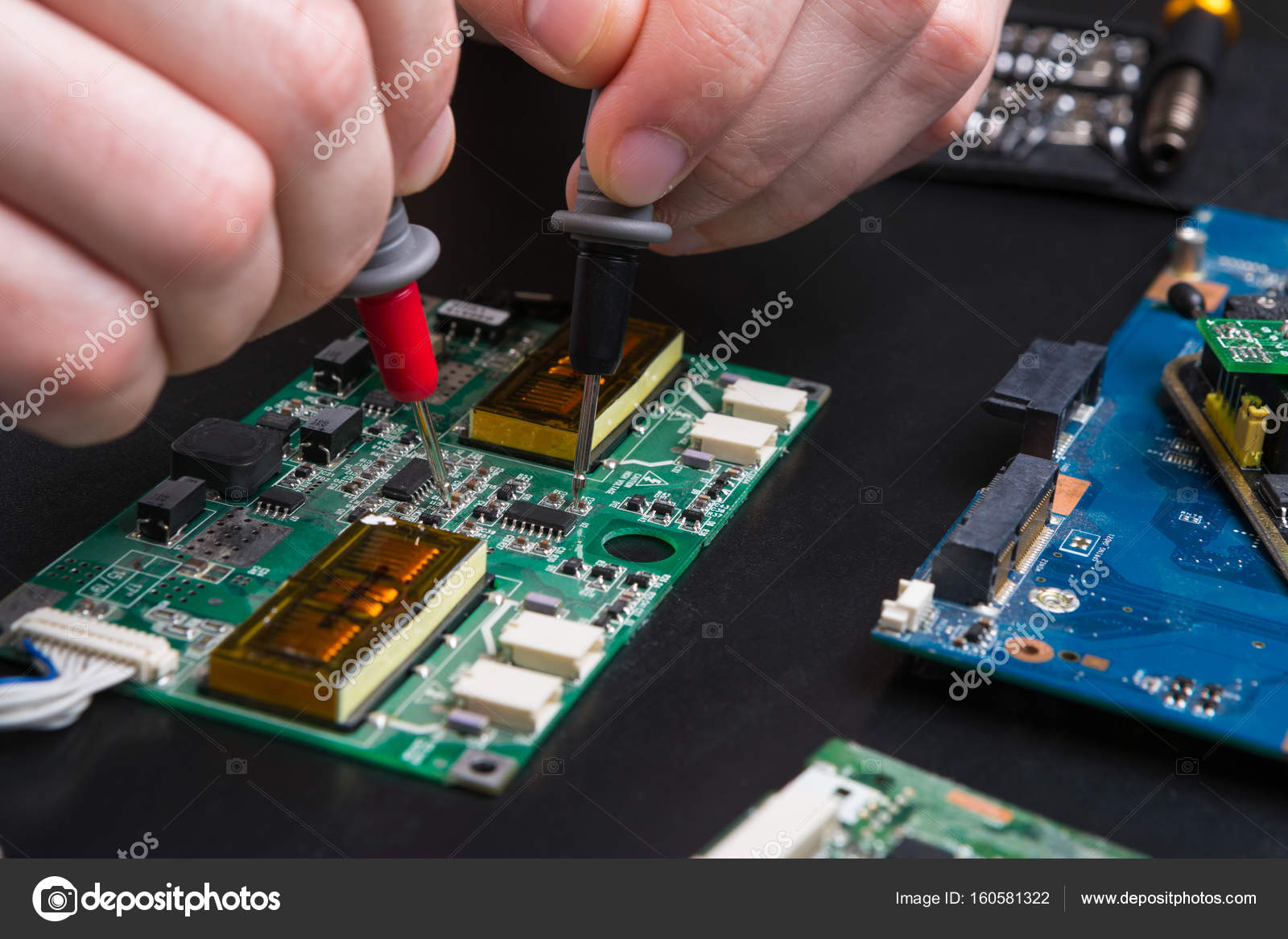 Electronic circuit board inspecting close up — Stock Photo © Milkos ...