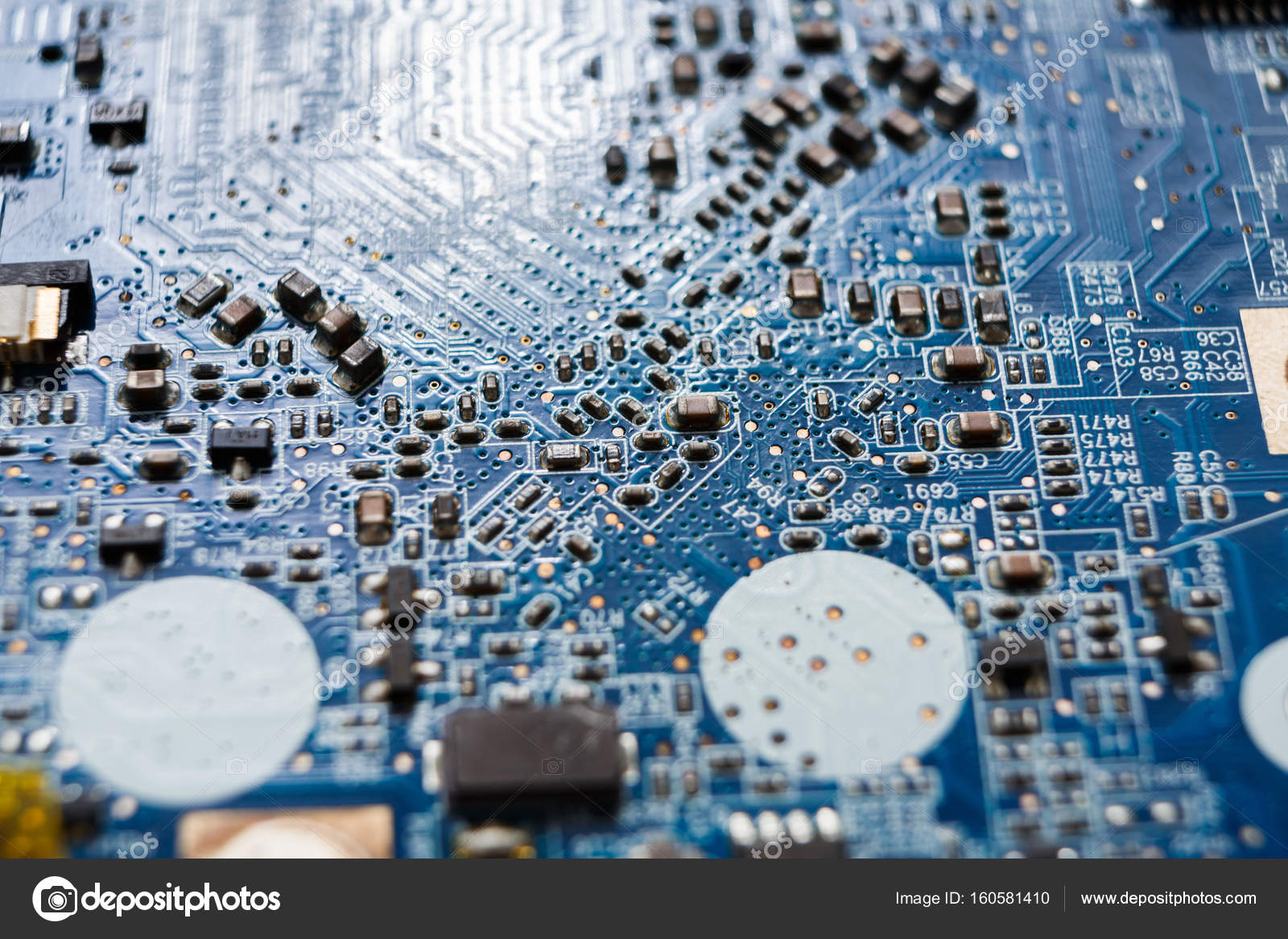 Laptop motherboard microcircuit closeup Stock Photo by ©Milkos 160581410