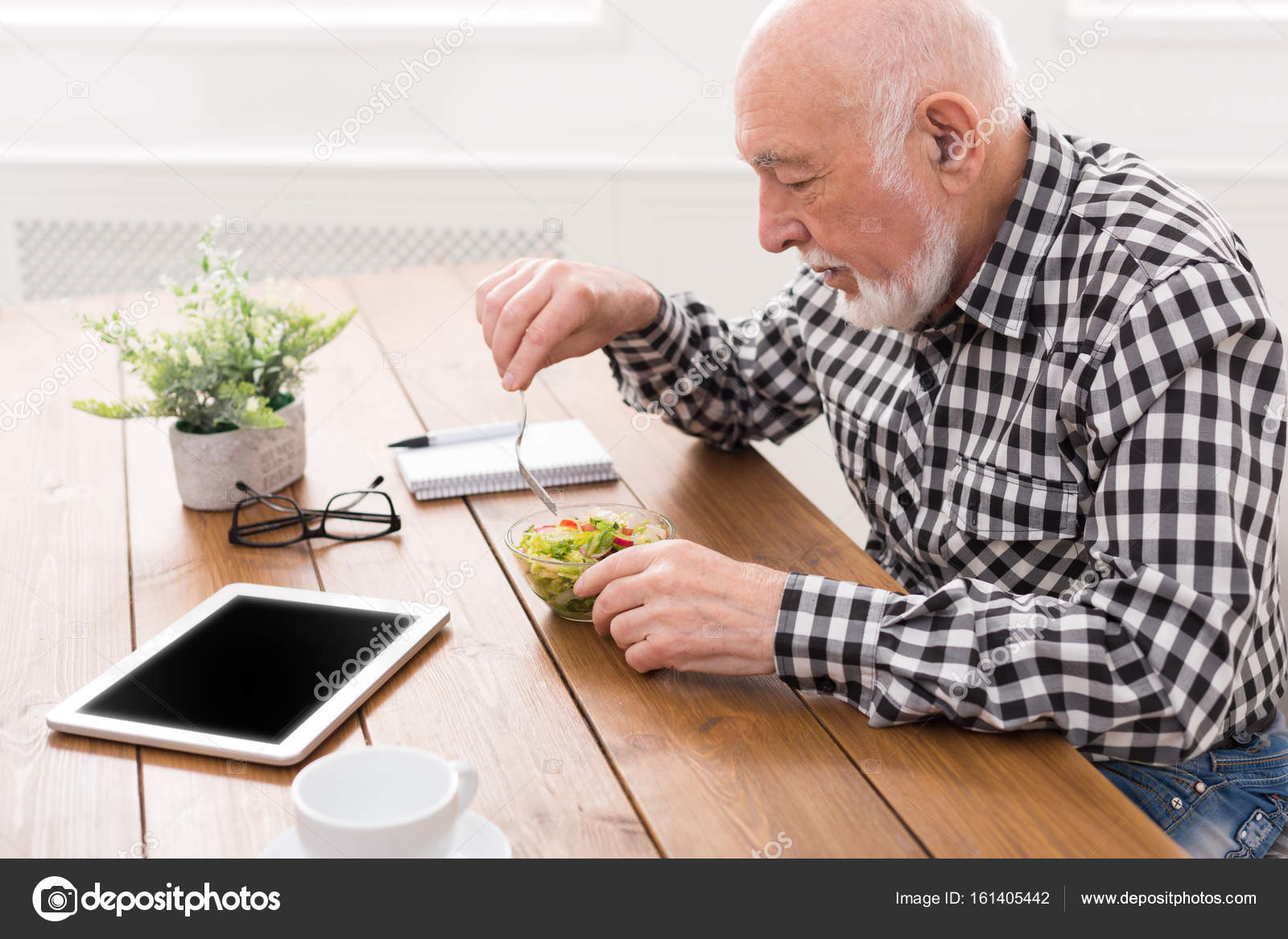 Senior man eating fresh salad side view — Stock Photo © Milkos #161405442 Senior man eating fresh salad side view — Stock Photo © Milkos #161405442